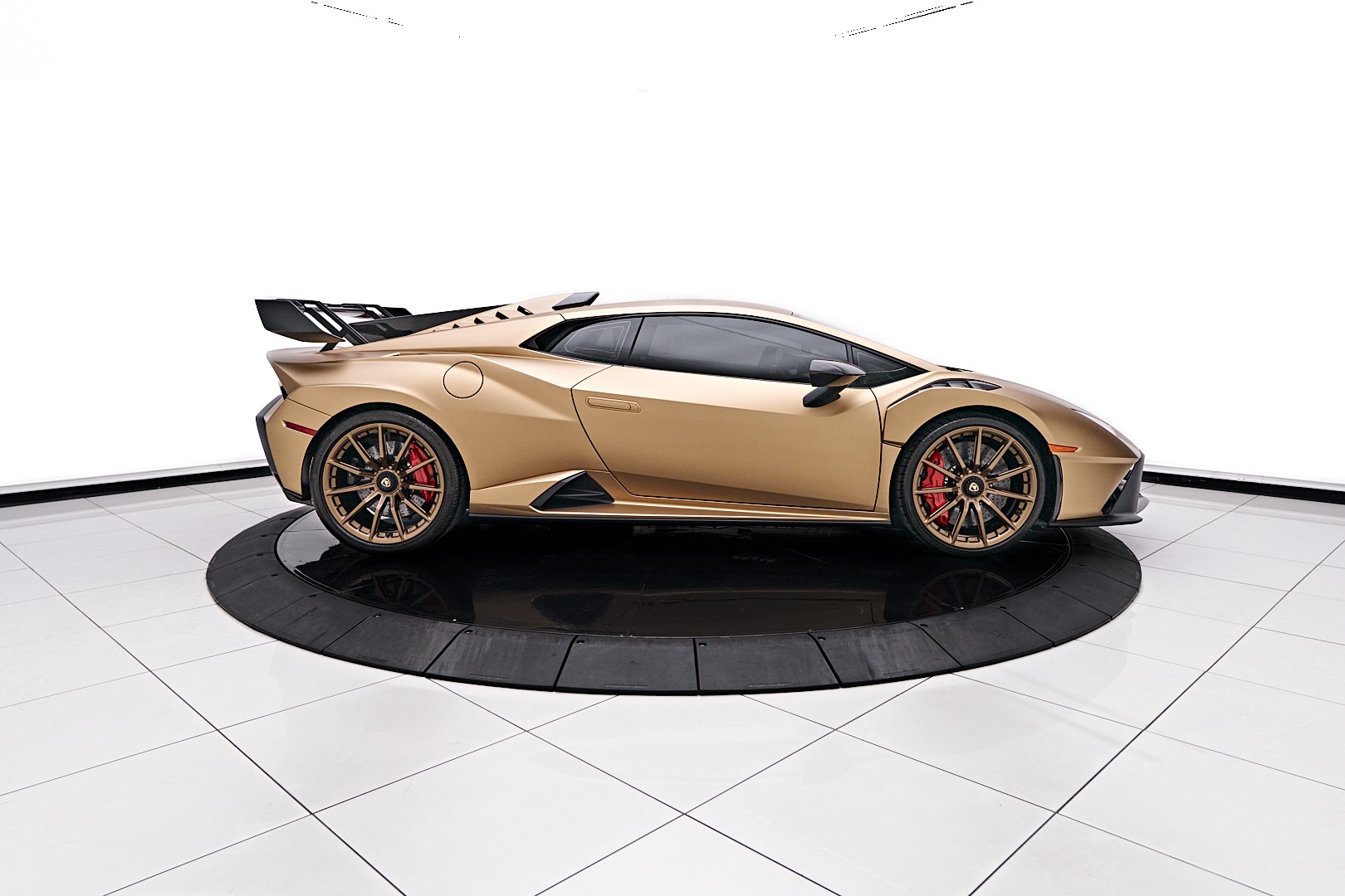 Gold Lamborghini Huracan Sto